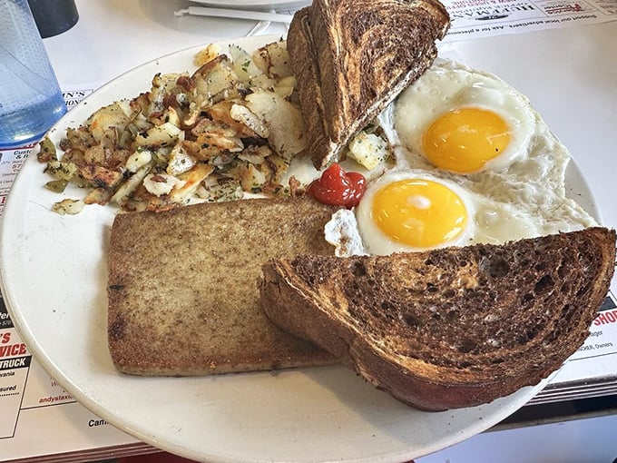 Two sunny-side-up eggs flanked by perfectly browned toast—the breakfast equivalent of waking up on the right side of the bed.