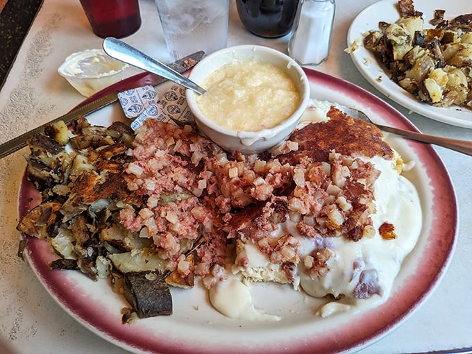 Breakfast nirvana: crispy home fries, country ham, and gravy that could make a vegetarian question their life choices. This is why elastic waistbands exist.