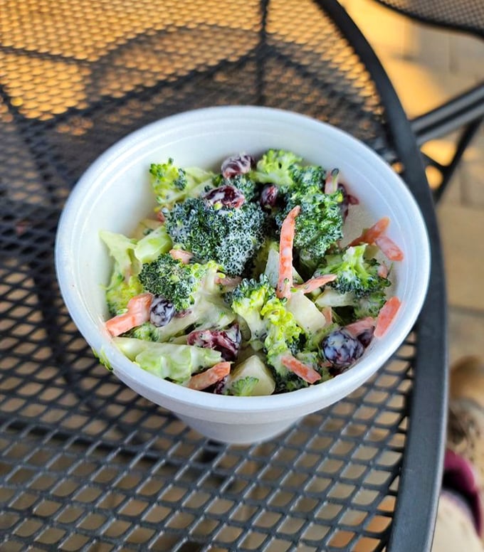 Even vegetables get the royal treatment here – this broccoli salad might be the only side dish that gets fought over as much as the meat.