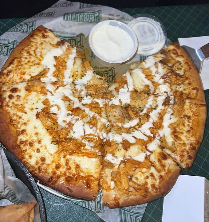 Buffalo chicken pizza that bridges two of America's greatest food inventions – the crispy, cheesy canvas topped with tangy buffalo chicken deserves its own food holiday.