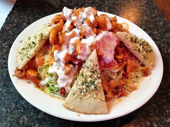 When buffalo chicken meets fresh salad, it's like introducing your wild friend to your sensible one—surprisingly, they get along beautifully.