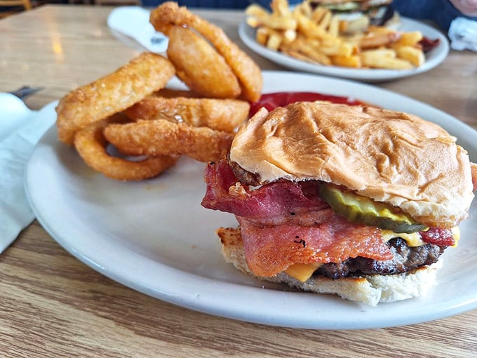 A burger that doesn't need a fancy name or 27 toppings—just honest beef, proper fixings, and onion rings that could double as edible jewelry.