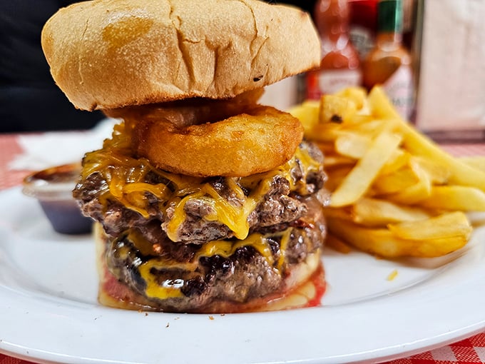 This isn't just a burger; it's a towering monument to American excess done right. Those hand-pressed patties and melty cheese demand both hands and extra napkins. 