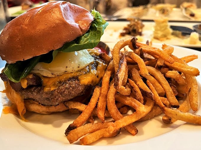 The burger at Orsay isn't just a burger—it's a masterclass in balance, with a golden brioche bun, melted cheese, and fries that deserve their own fan club.