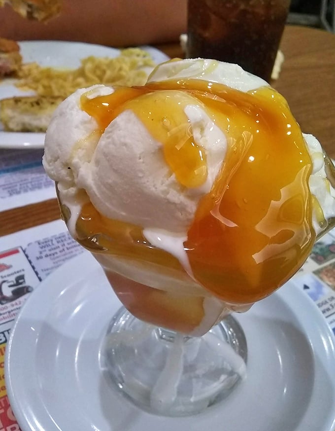 Ice cream and butterscotch sauce – proof that sometimes the simplest desserts are the ones that make you close your eyes in silent appreciation.