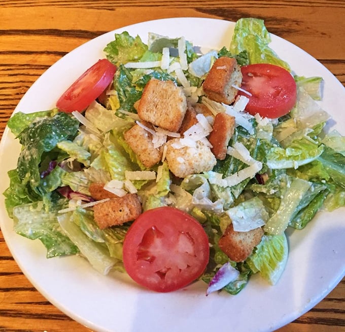 A Caesar salad that actually deserves its imperial name – crisp romaine, house-made croutons, and parmesan that wasn't born in a green can.