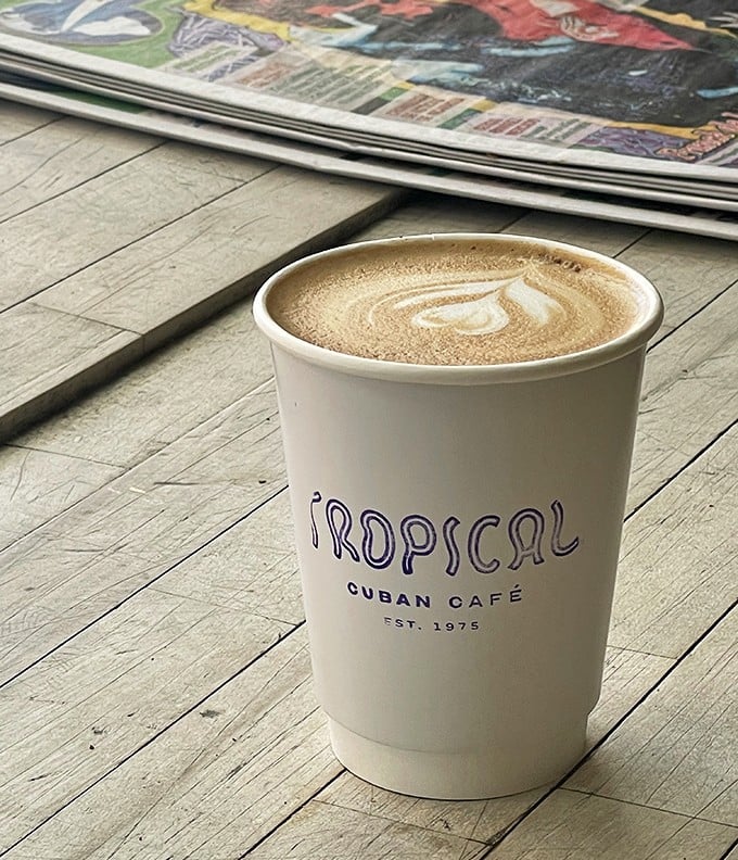 Their café con leche comes in a cup that proudly announces its heritage—strong Cuban coffee mellowed with milk into liquid comfort.