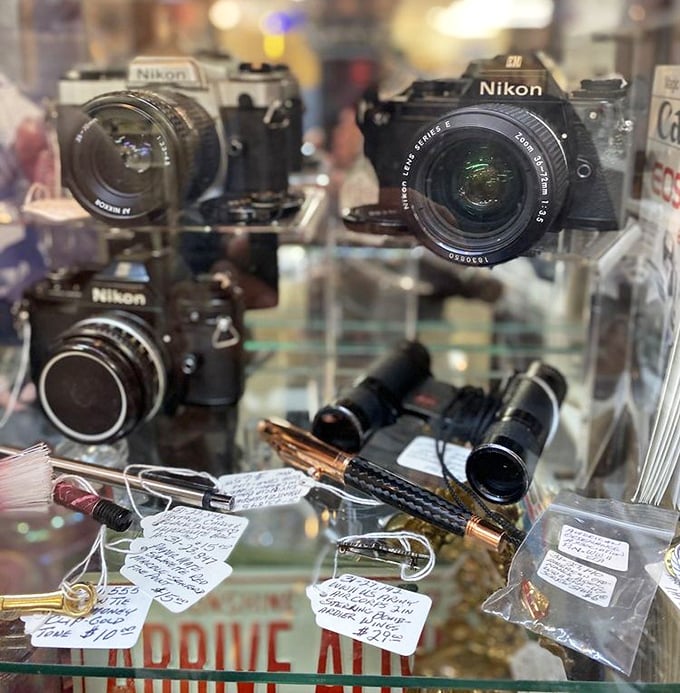 Vintage Nikon cameras that captured family memories long before smartphones existed. These mechanical marvels still work perfectly—no charging required!