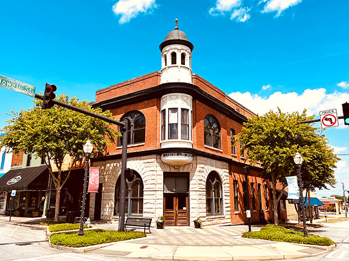 The Carter Law Building stands sentinel at the corner, its cupola keeping watch over downtown like a architectural version of "Law & Order: Small Town Unit."
