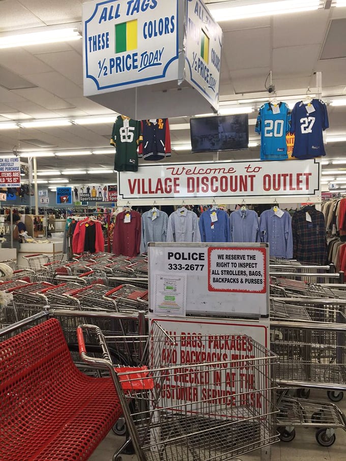 Shopping cart central – where your thrifting chariot awaits. Note the half-price tag signs overhead, the siren call of additional savings.