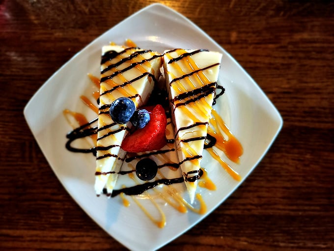 Cheesecake dressed for a night out – caramel drizzle and chocolate playing across the canvas like Jackson Pollock with a sweeter palette.