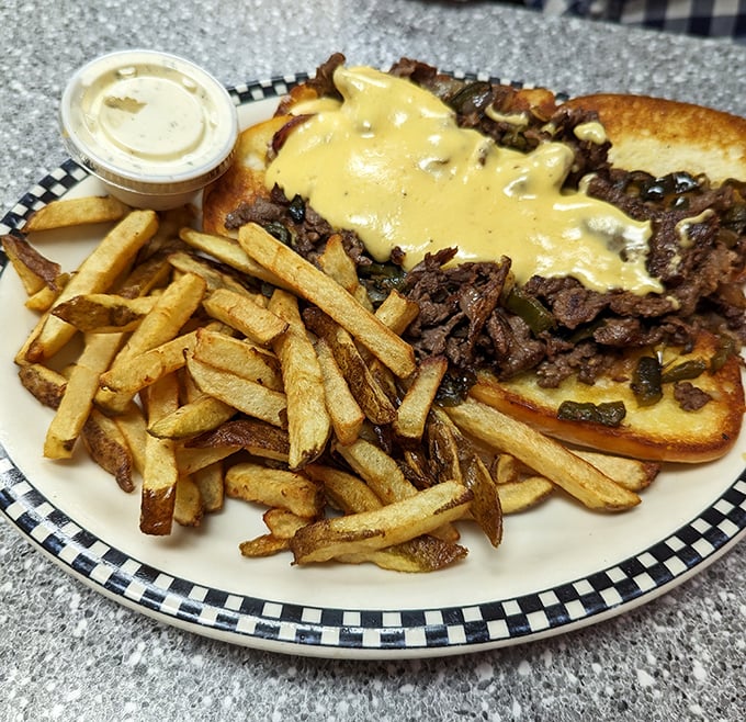 This isn't just a cheesesteak—it's a masterclass in comfort food architecture, where beef, cheese, and perfectly crisp fries create the holy trinity of satisfaction.