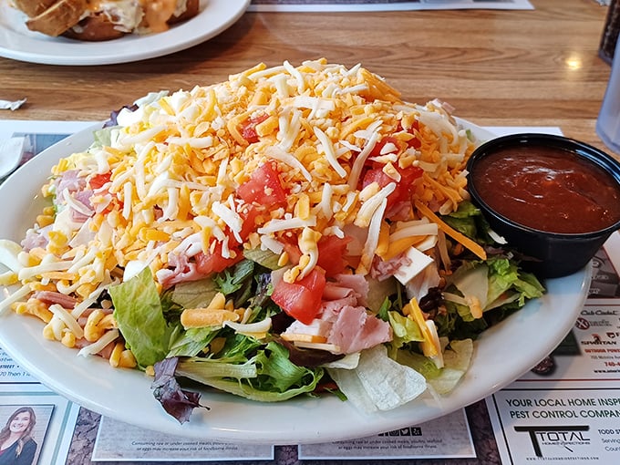 This isn't just a salad – it's a colorful rebellion against boring lunches, topped with enough cheese to make even vegetables exciting.