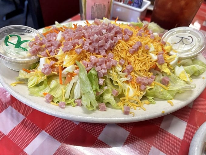 This chef salad isn't just phoning it in with a few sad vegetables—it's a colorful celebration topped with generous portions of cheese and ham.