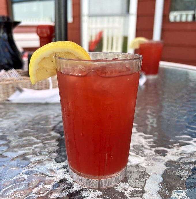Cherry ade with a lemon wedge—because sometimes your taste buds deserve a vacation to a place where everything is the color of happiness.