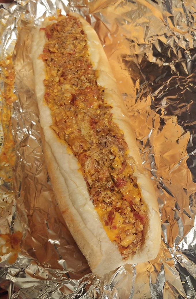 Not all heroes wear capes—some come wrapped in foil. This cheesesteak is the comfort food equivalent of a warm hug on a cold Pennsylvania day.