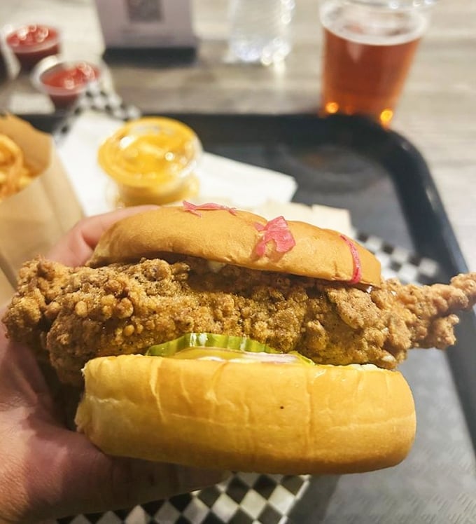 The crispy chicken sandwich – a monument to the art of frying. That golden-brown crust makes Colonel Sanders look like an amateur.