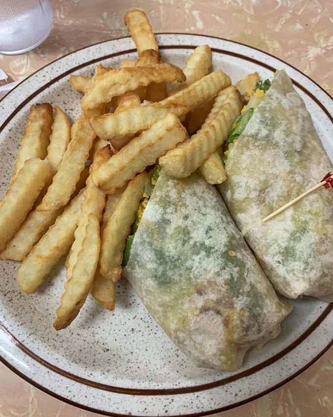 A wrap that's actually wrapped properly – no filling escaping, no soggy bottom, just crispy fries alongside that make lunch feel like a victory.