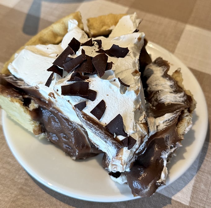 This chocolate cream pie isn't just dessert—it's therapy. Layers of chocolate, cream, and more chocolate that would make Willy Wonka jealous.