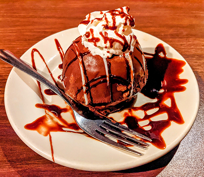 A chocolate dessert that doesn't just satisfy your sweet tooth—it throws a party for it, complete with whipped cream and chocolate drizzle confetti.