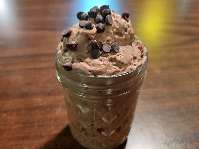 Mason jar dessert perfection – because after conquering mountains of meat, your sweet tooth deserves its own little victory dance with chocolate chips.