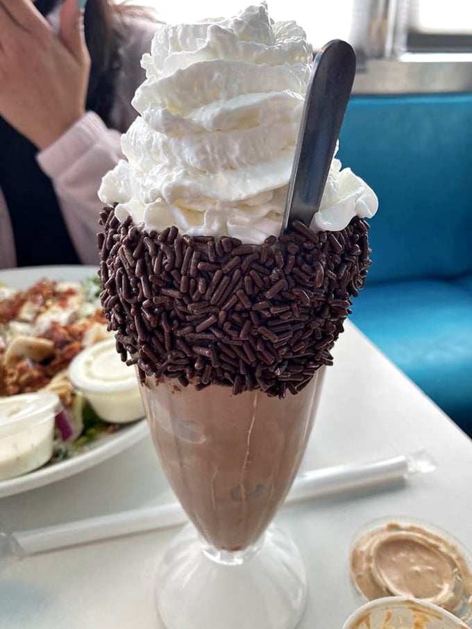 Chocolate shake wearing its Sunday best. Those chocolate sprinkles aren't decoration—they're a commitment to going above and beyond the call of dessert.
