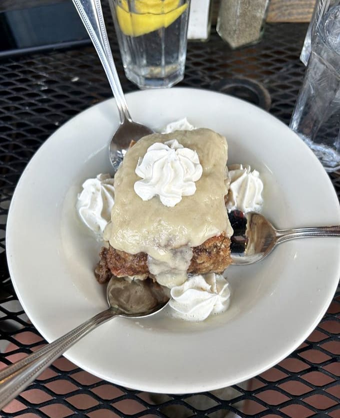 Dessert that makes you question your life choices – not ordering two portions of this cinnamon roll bread pudding might be your biggest regret of the year.