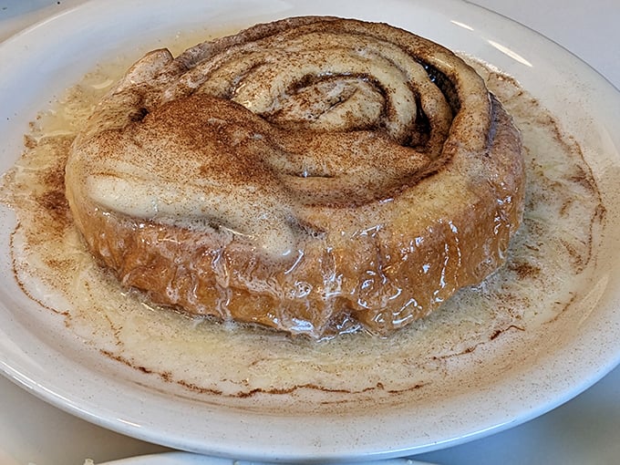 This cinnamon roll spiral could hypnotize you with its buttery, glazed perfection and whipped butter crown.