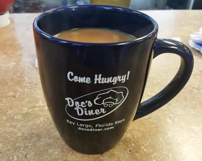 Their coffee mug says "Come Hungry!" which is both an invitation and a warning about the portion sizes to come.