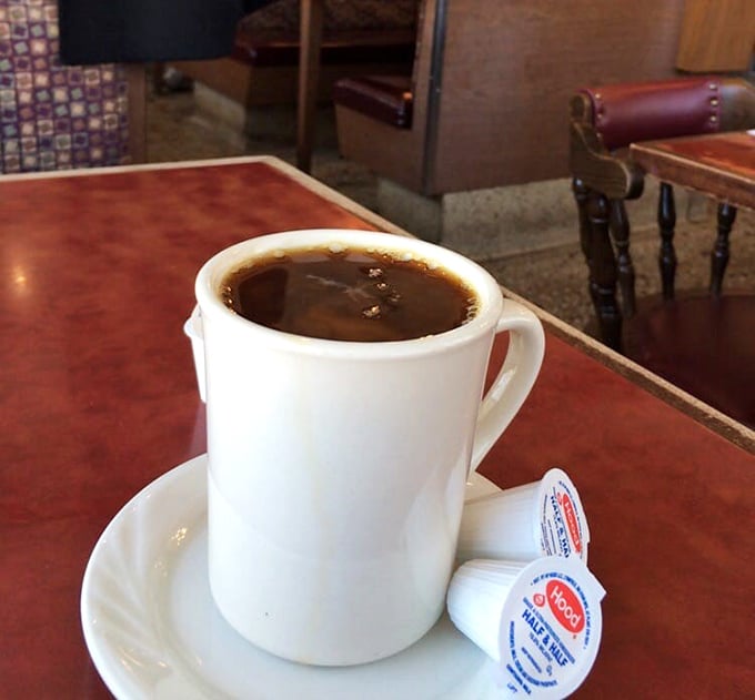 That classic diner coffee – somehow always better than what you brew at home, served in the iconic thick white mug that says "refills welcome."