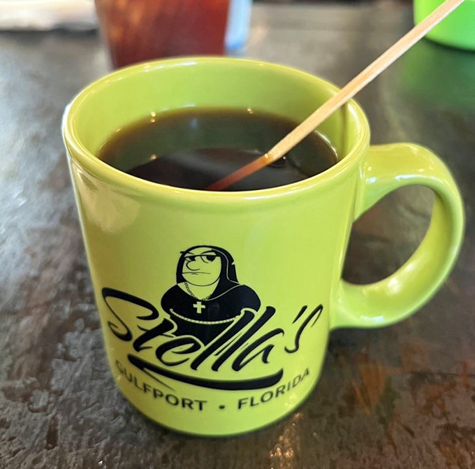The lime green mug isn't just a vessel—it's a promise. This coffee will jumpstart your day with the same boldness as the diner's exterior.