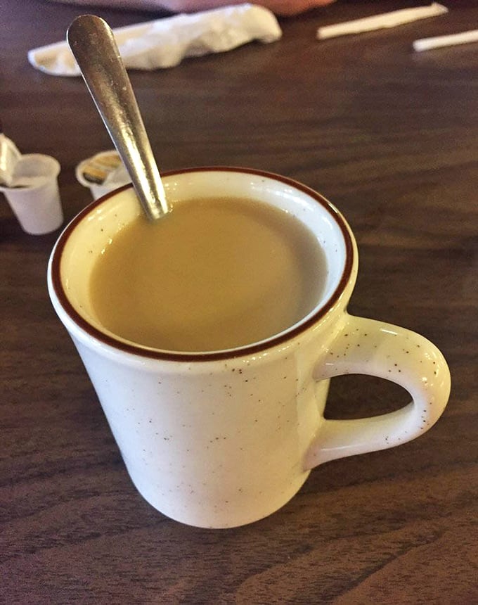 This isn't just coffee—it's morning motivation in ceramic form, served in the kind of mug that makes you want to sit and solve all the world's problems.