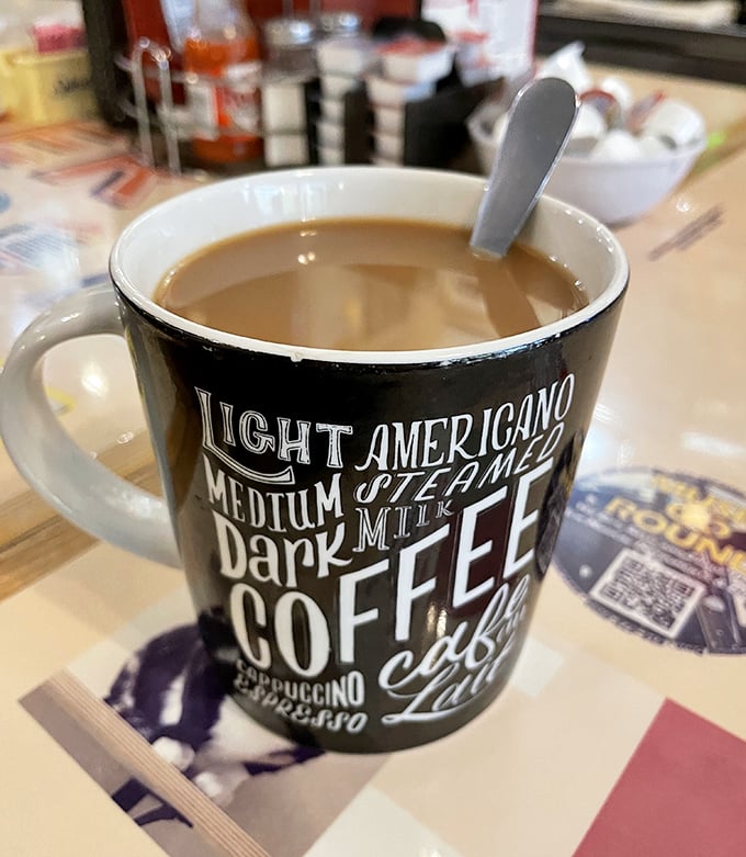 Diner coffee in a mug that tells it like it is—not pretentious, not fancy, just the reliable companion to every great breakfast.