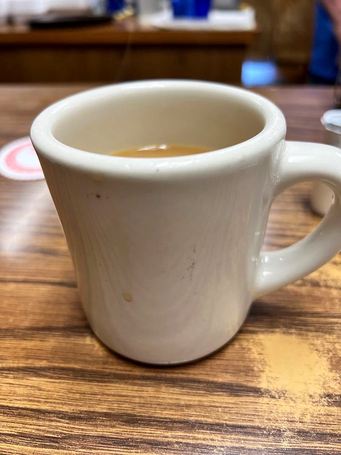 The humble diner mug—steadfast companion to countless conversations, keeper of liquid ambition, and America's true unsung hero.