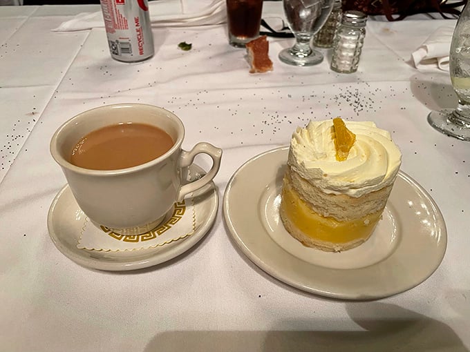 Coffee and dessert—the encore after the main performance. That whipped cream mountain could double as a pillow for sweet dreams.