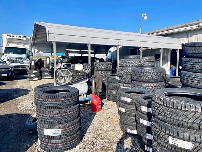 Rubber meets the road at Rogers' automotive section, where practical shoppers find tires stacked like donuts at a police convention.