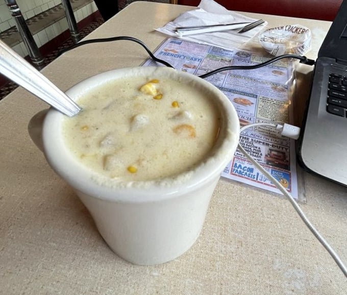 Corn chowder thick enough to stand a spoon in—comfort in a cup that whispers, "Cancel your plans, we're having a moment here."
