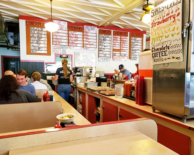 The counter view offers a front-row seat to the breakfast ballet, where servers navigate the morning rush with the grace of seasoned performers.