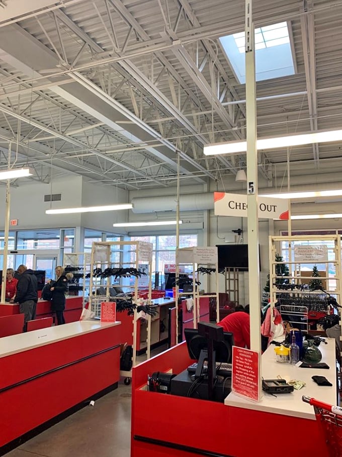 The checkout area features the distinctive Salvation Army red, where treasures are tallied and bargains become official possessions.