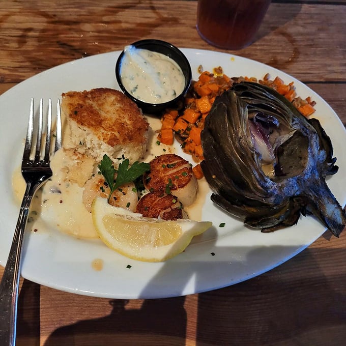 The crab cake and scallop combo plate—where "sharing is caring" meets "get your own, this is too good to divide."