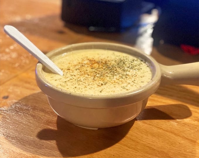 This cream of crab soup isn't just a starter—it's a warm, velvety embrace in a bowl, topped with a sprinkle of spice that whispers, "Welcome home."