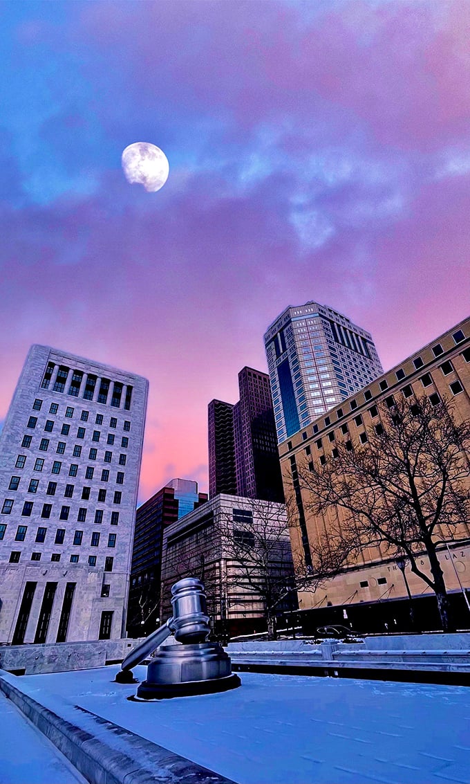 Twilight transforms the gavel into something magical—part legal symbol, part urban fairy tale against Columbus's purple-hued evening sky.