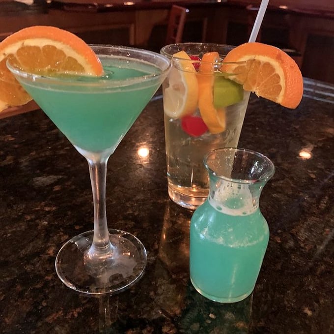 Electric blue cocktails that taste like Florida in a glass. The kind of drinks that make you forget you have a flight home eventually.