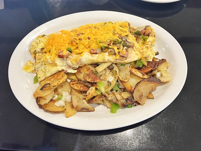 The Denver omelet doesn't just visit flavor town – it buys property and settles down. Those home fries are the friendly neighbors.
