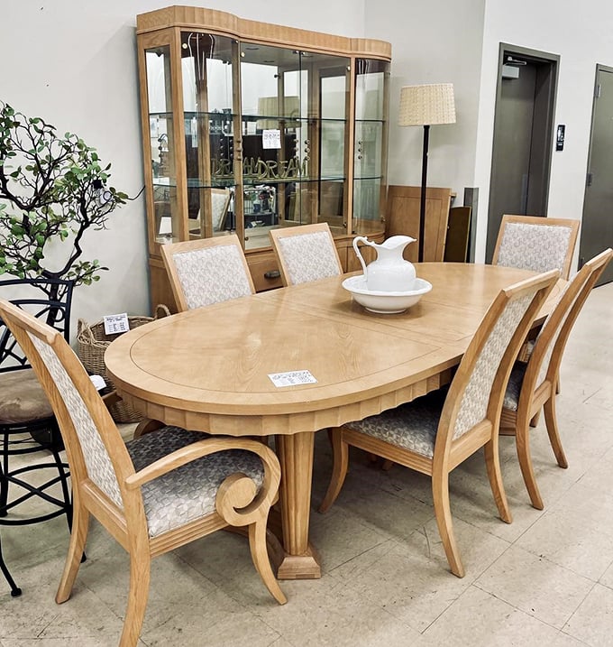 This elegant dining set isn't just furniture—it's the backdrop for future family Thanksgiving arguments and birthday celebrations.