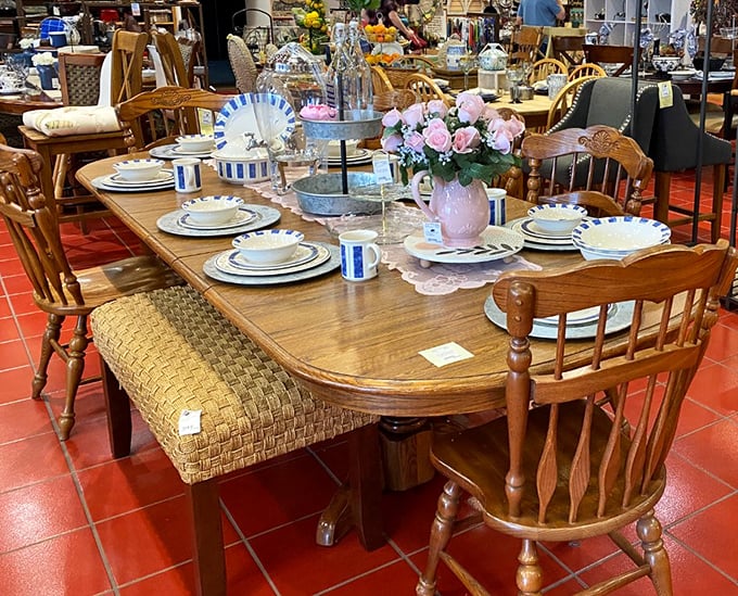 This oak dining set isn't just furniture—it's the stage for future Thanksgiving dramas and birthday celebrations yet to unfold.