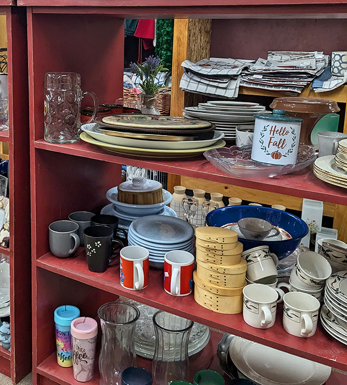 Mismatched dishes with perfectly matched charm. That "Hello Fall" sign might just be the seasonal touch your kitchen table has been missing.