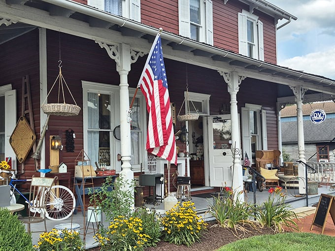 Front porch Americana that makes HGTV designers weep with joy. Wicker baskets, flag, and flowers—the original social network.