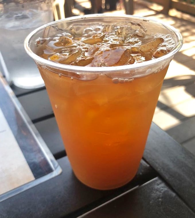 A perfectly amber iced tea catching the afternoon sun – because sometimes the simplest refreshment is exactly what the doctor ordered after miles on the trail.