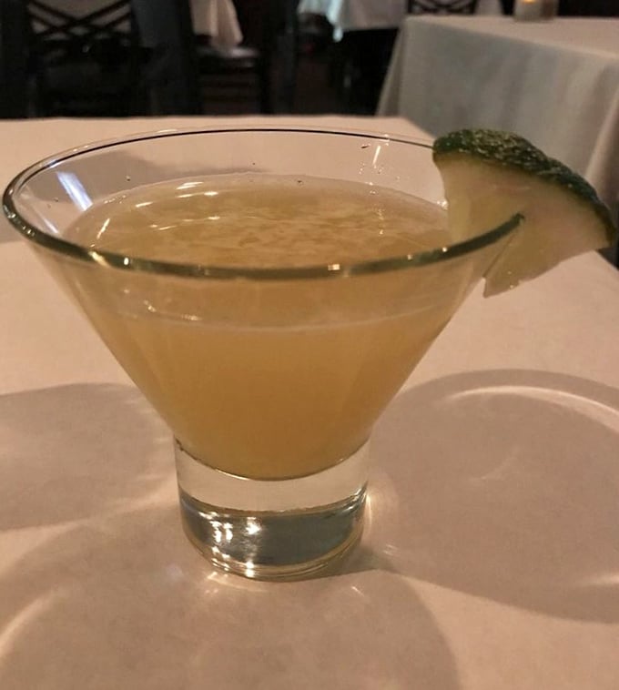 A cocktail that captures sunshine in a glass, complete with cucumber garnish. Sipping this feels like stealing a moment of vacation on an ordinary Tuesday.